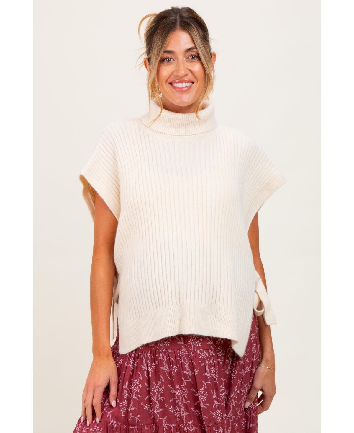 Click here for Pinkblush Maternity Cream Turtleneck Sweater Vest... prices