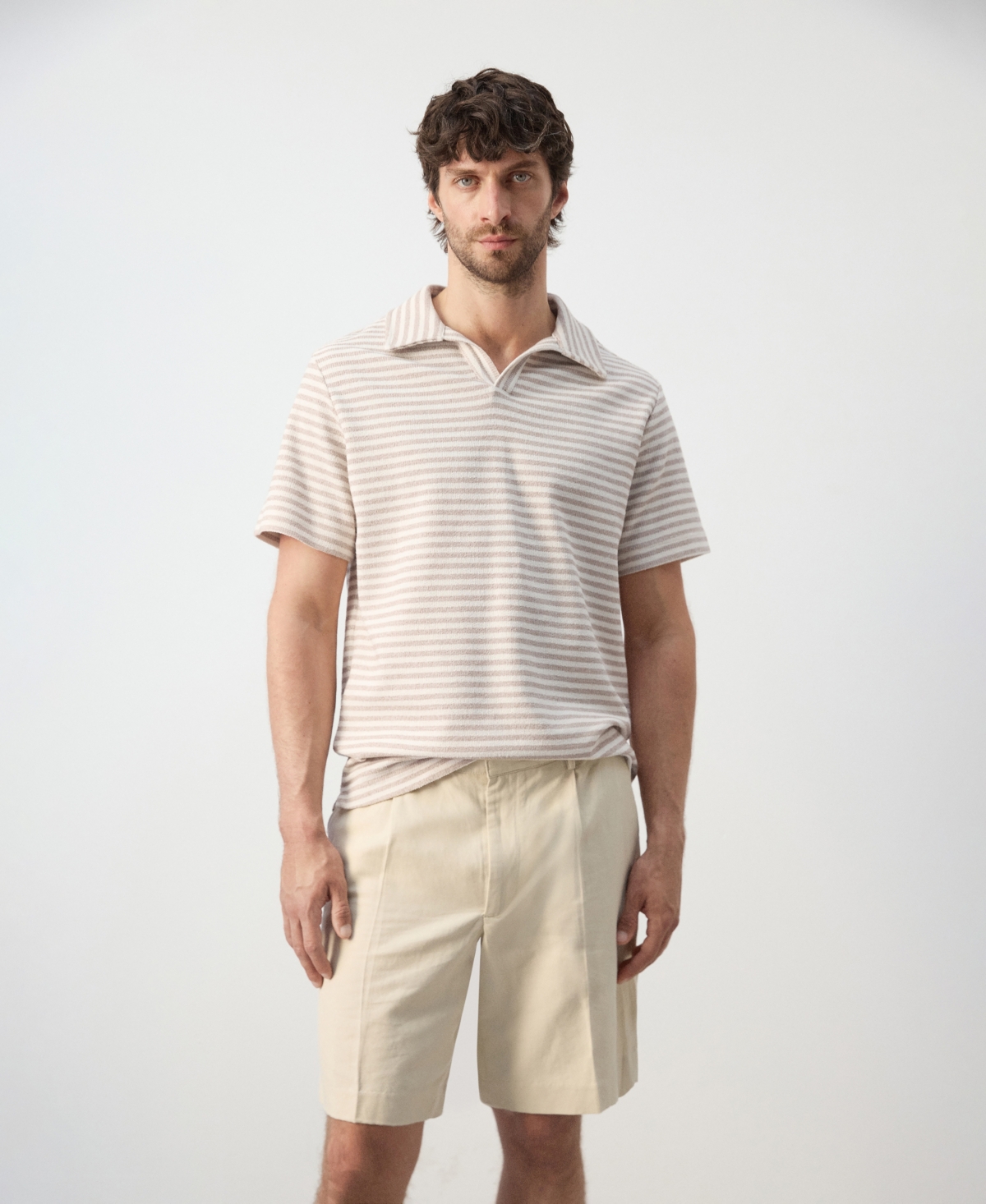 Click here for Mango Mens Regular-Fit Textured Striped Polo - Bei... prices