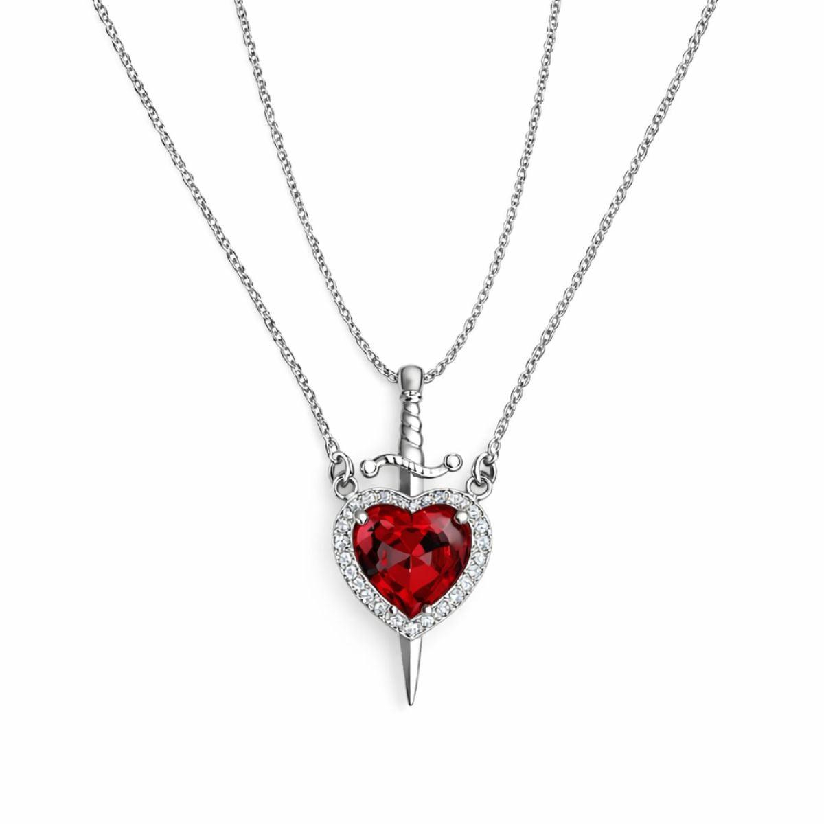 Click here for Rebl Jewelry Gold Heart and Dagger 2-Piece Necklac... prices