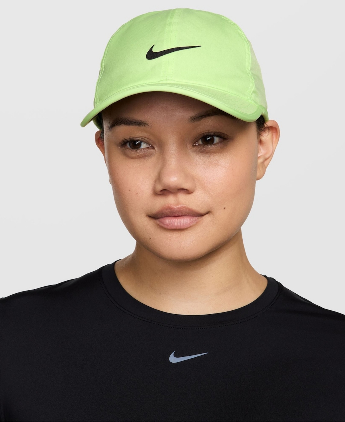 Click here for Nike Mens and Womens Neon Green Featherlight Dri-f... prices