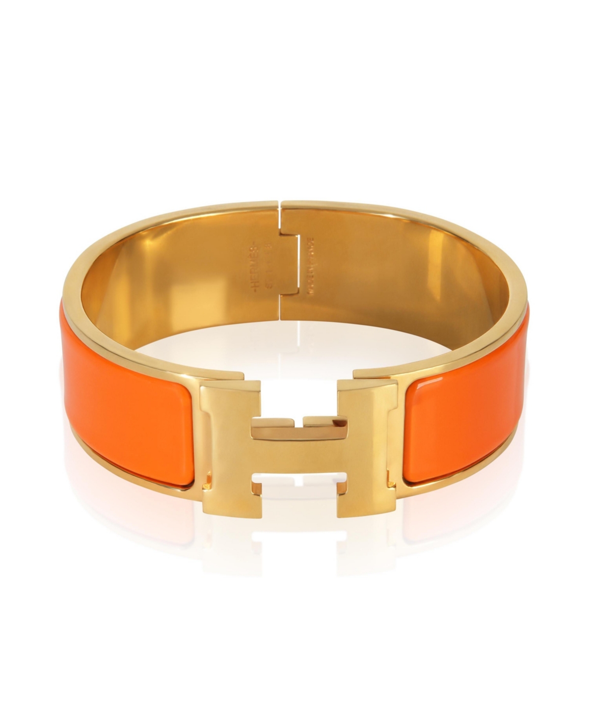 Click here for Pre-Owned Hermes Gold-Plated Clic Clac In Orange F... prices