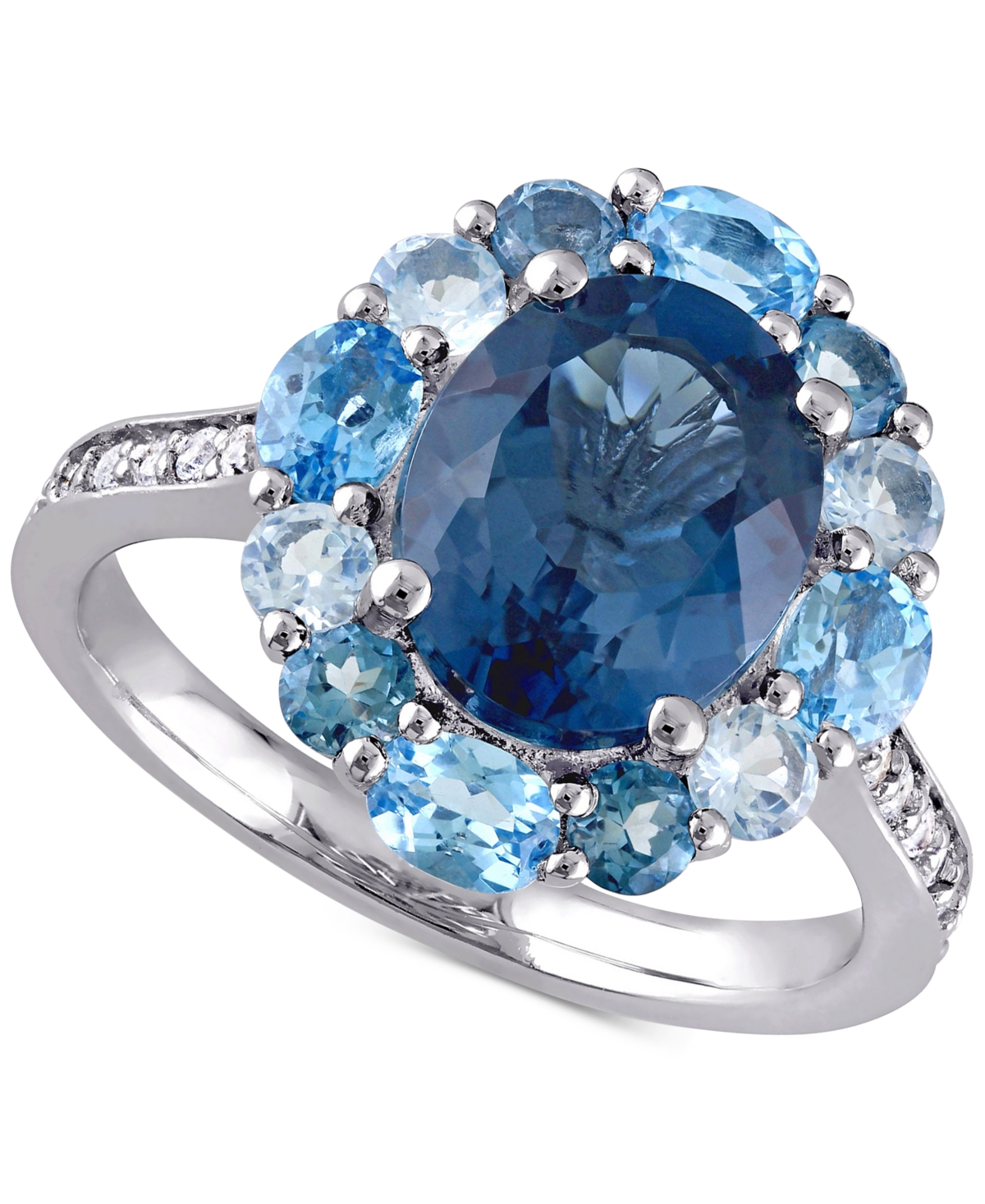 Click here for Blue Topaz Oval Halo Statement Ring (5-3/8 ct. t.w... prices