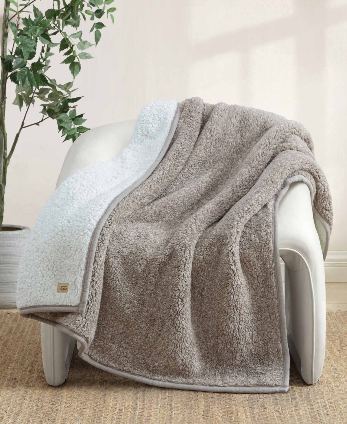 Click here for Ugg Classic UGGfluff Throw  50 x 70 - Fawn prices