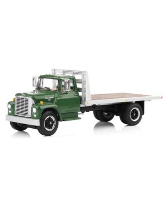 Click here for First Gear 1 64 1970s International Loadstar Flatb... prices