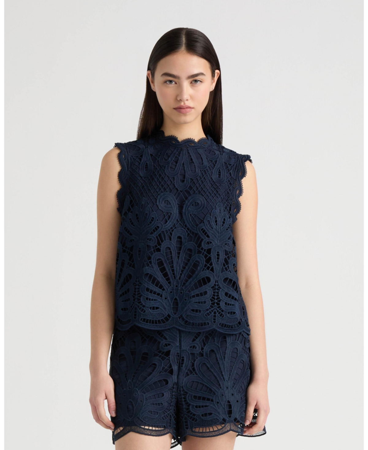 Click here for Nvlt Womens Sleeveless Mock Neck Lace Top - Navy prices