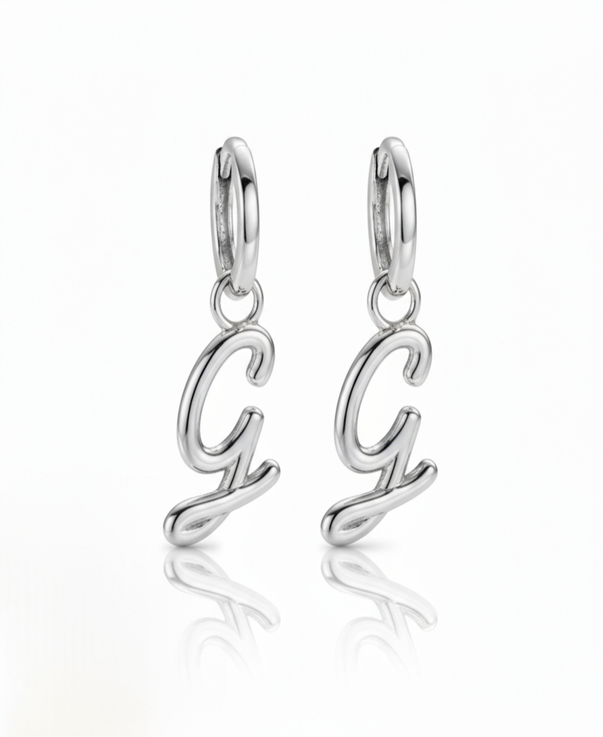 Click here for Oak & Luna Mini Signature Initial Huggie Earrings... prices