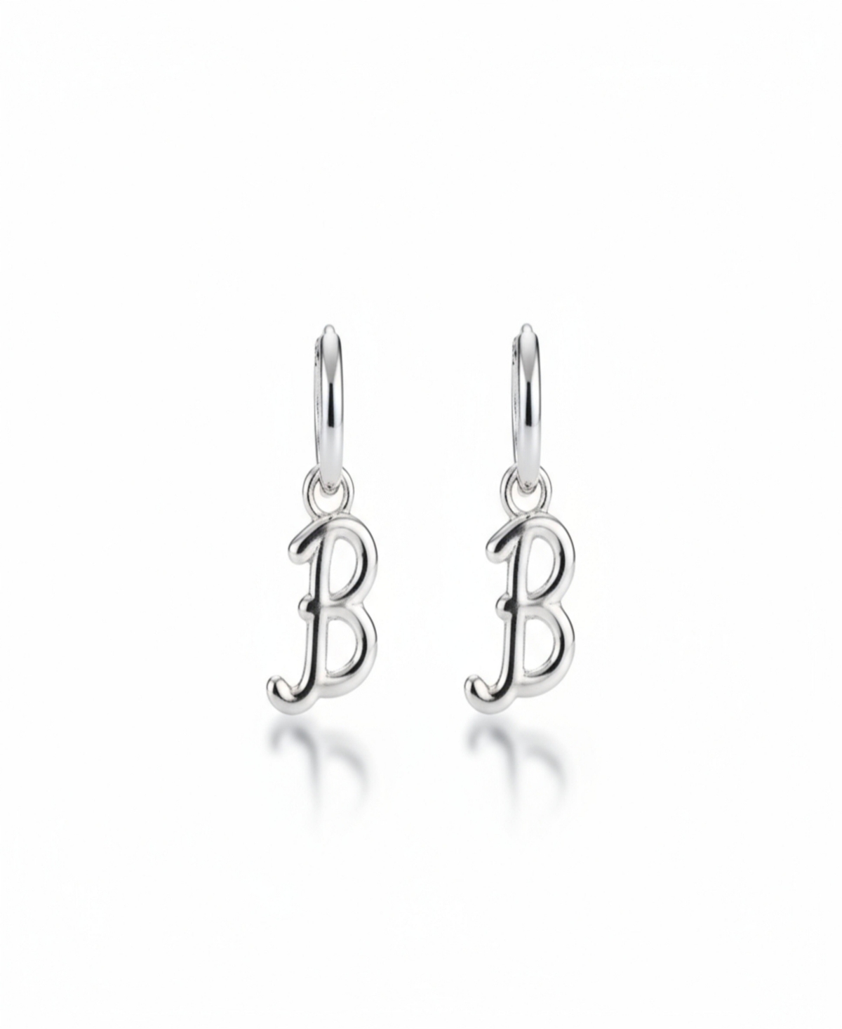 Click here for Oak & Luna Mini Signature Initial Huggie Earrings... prices
