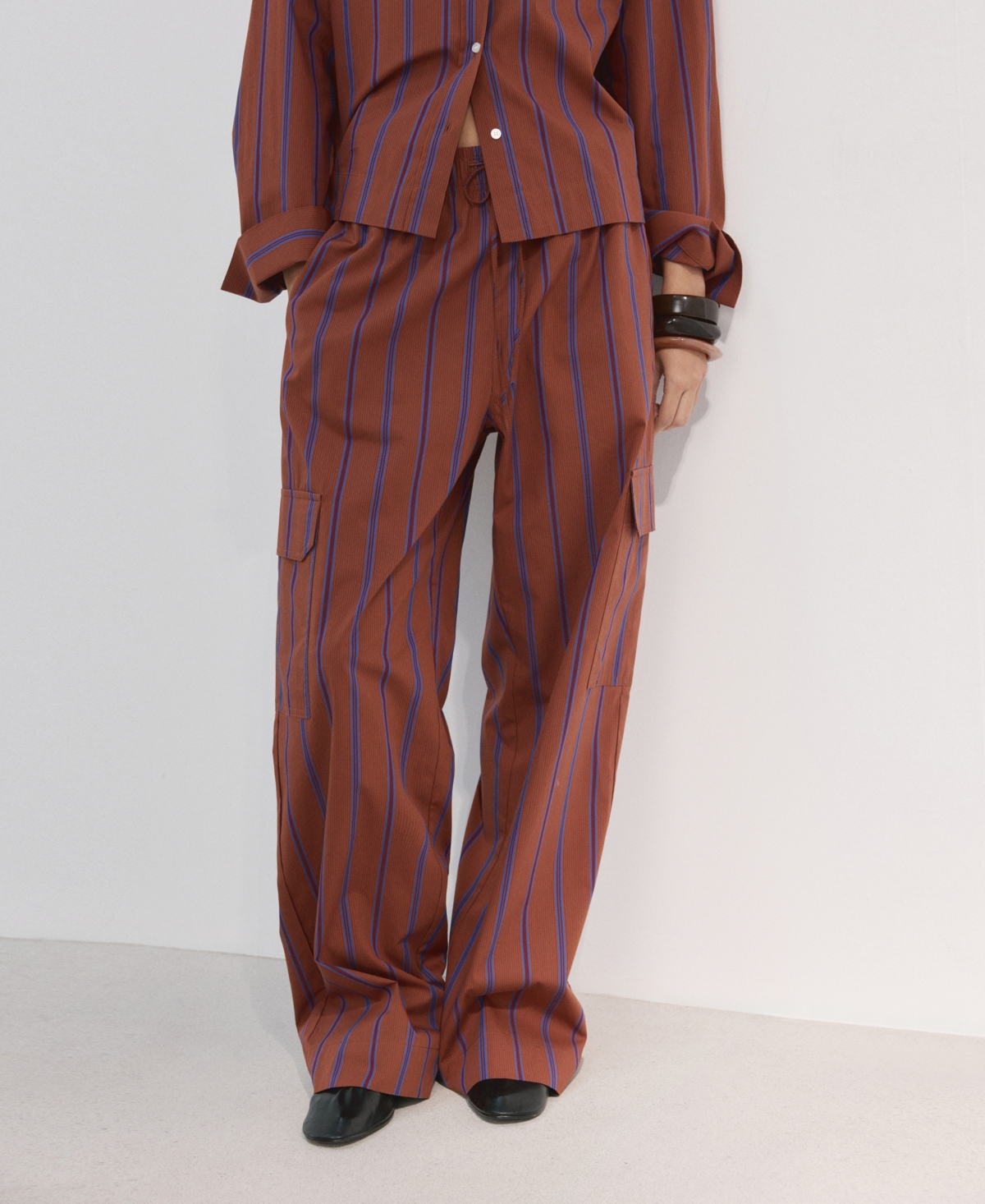 Click here for Mango Womens Side Pockets Cargo Pants - Russet prices