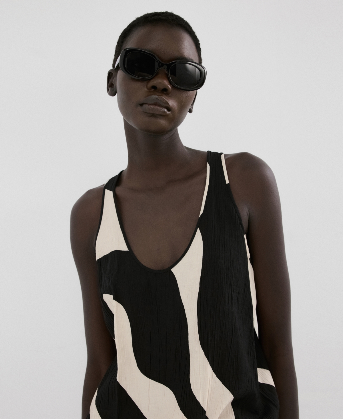 Click here for Mango Womens Printed Straight Top - Black prices