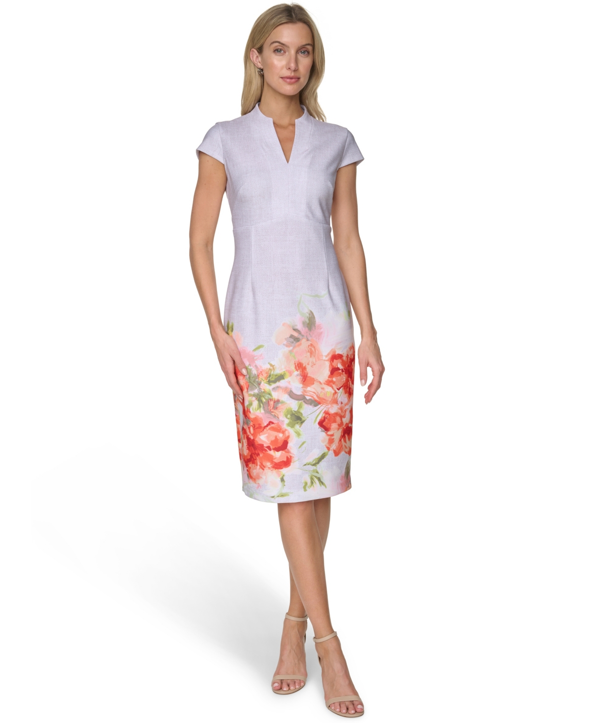 Click here for Calvin Klein Petite Placement Printed Split V-Neck... prices