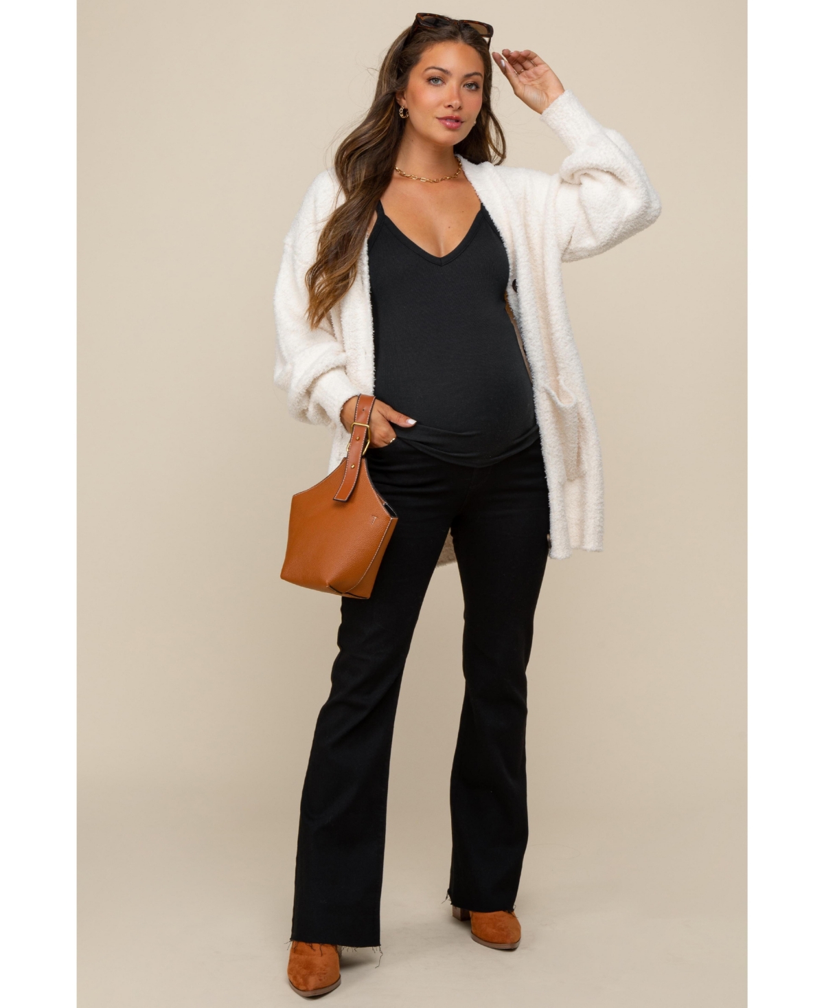 Click here for Pinkblush Maternity Black Flare Leg Raw Hem Jeans... prices