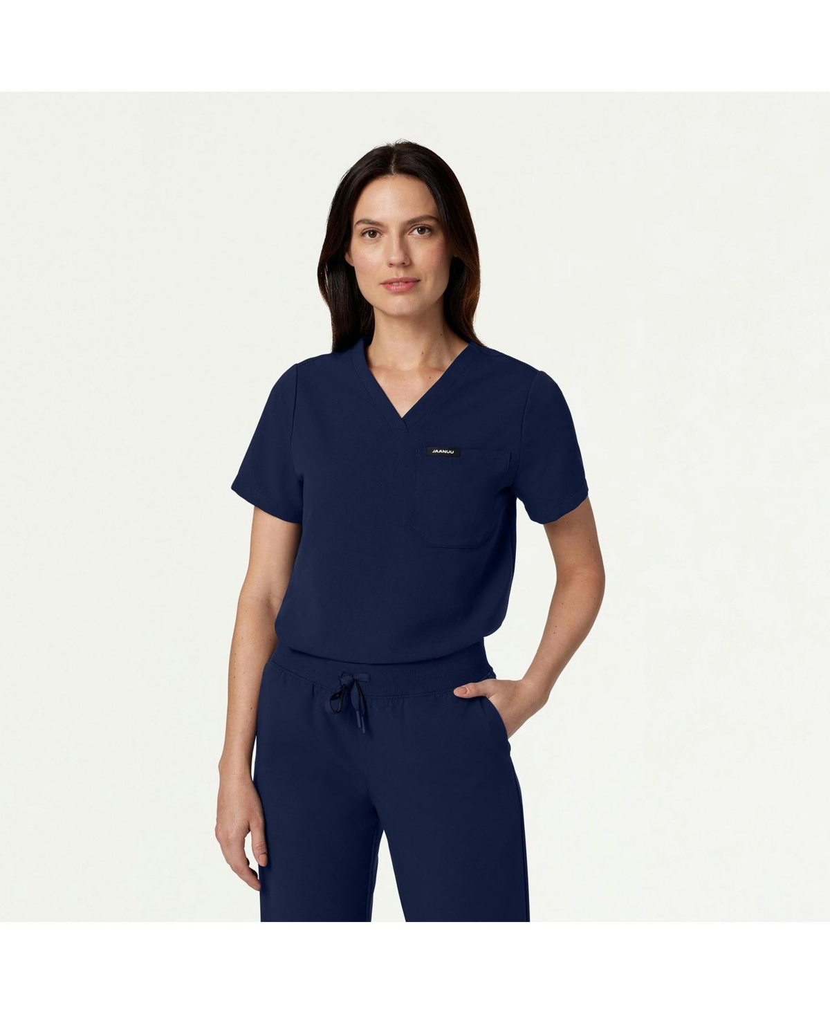 Click here for Jaanuu Plus Size Rhena 1-Pocket Classic V-Neck Scr... prices