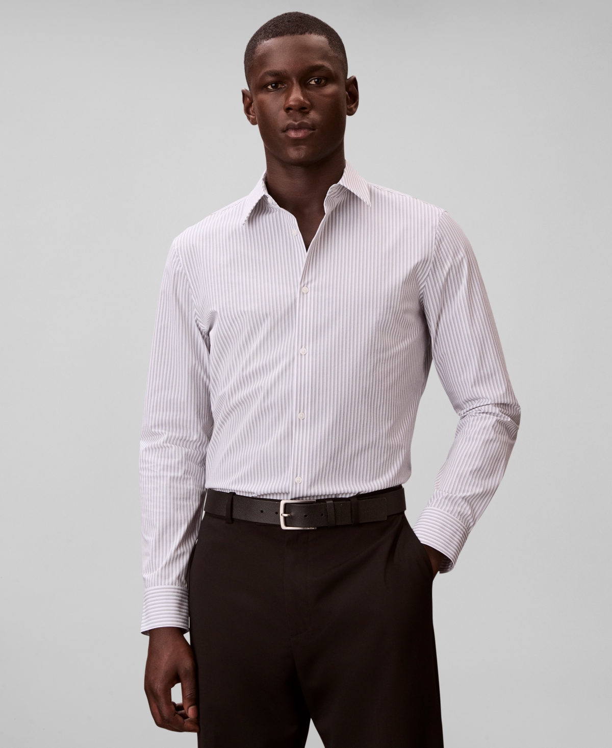 Click here for Calvin Klein Mens Stripe Tech Slim-Fit Button-Down... prices