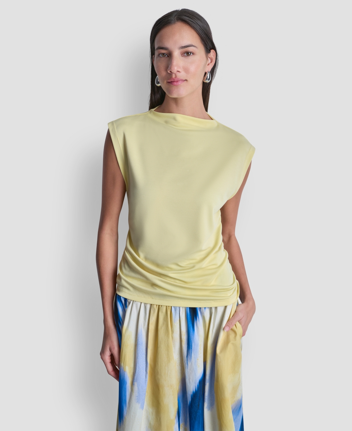 Click here for Dkny Womens Sleeveless Pique Top - Buttercream prices