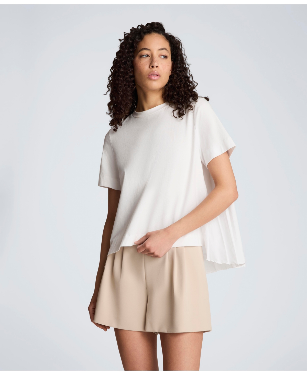 Click here for Kenneth Cole Womens Short-Sleeve High-Low Pleated... prices