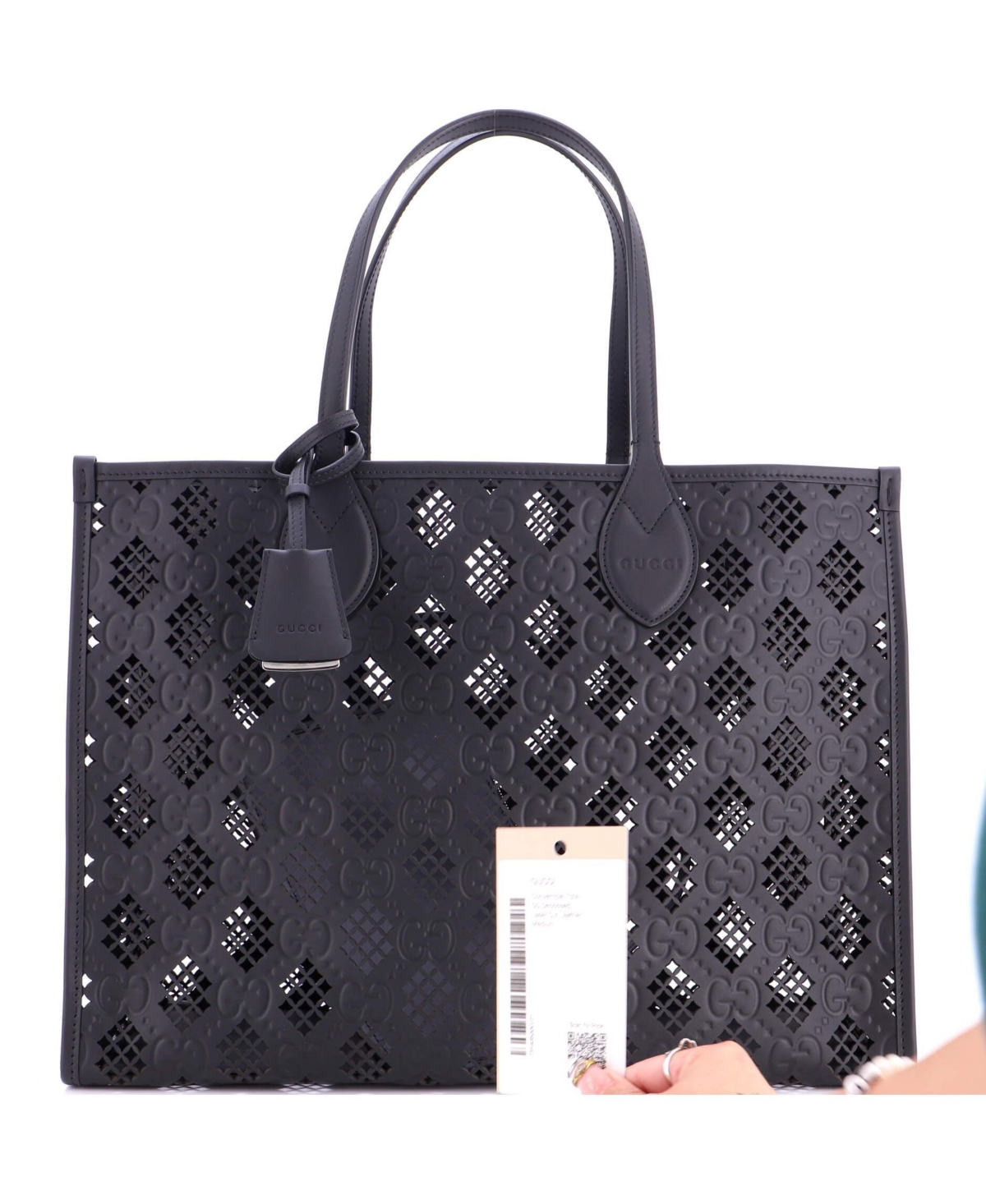 Click here for Pre-Owned Gucci Medium Convertible Tote Gg Debosse... prices