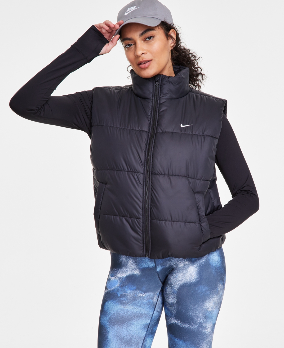 Click here for Nike Womens Therma-fit Vest - Black/white prices