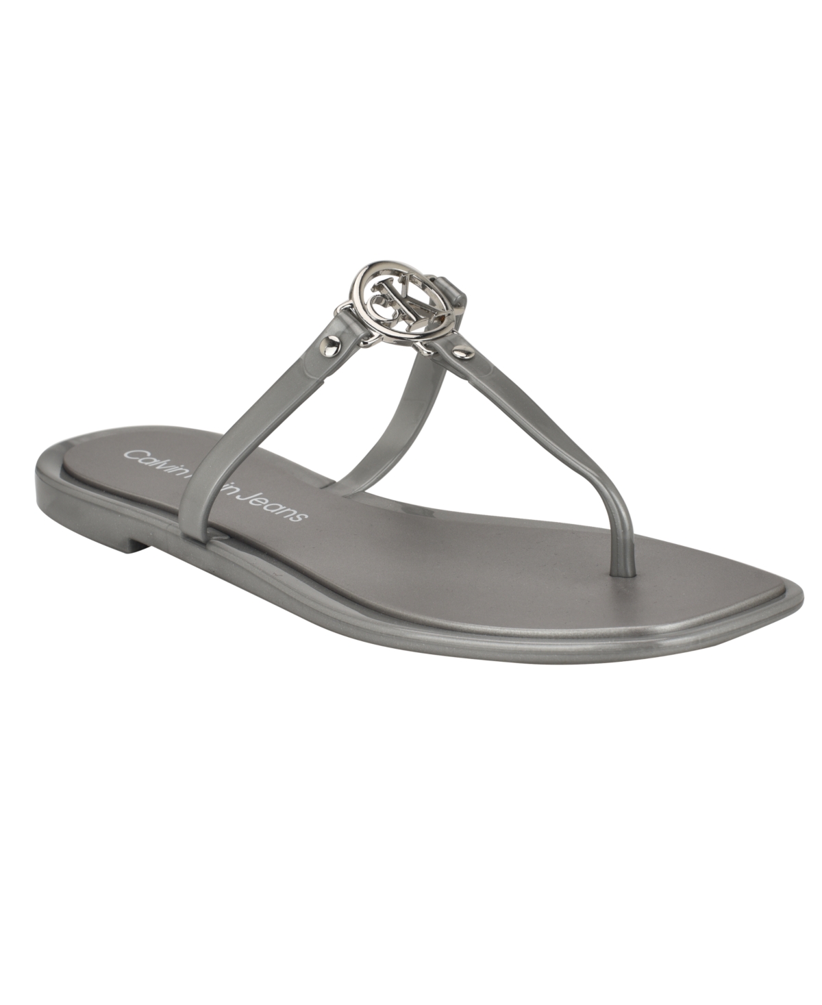 Click here for Calvin Klein Womens Edhen Logo T-Strap Flat Jelly... prices