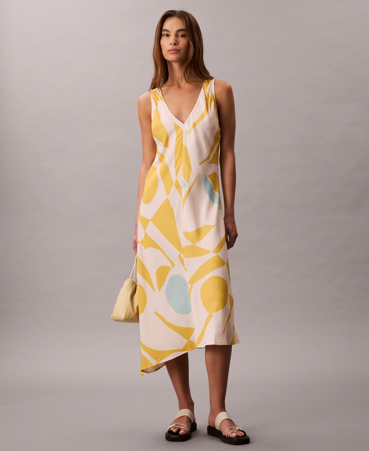 Click here for Calvin Klein Womens Geo-Print Asymmetrical-Hem Mid... prices