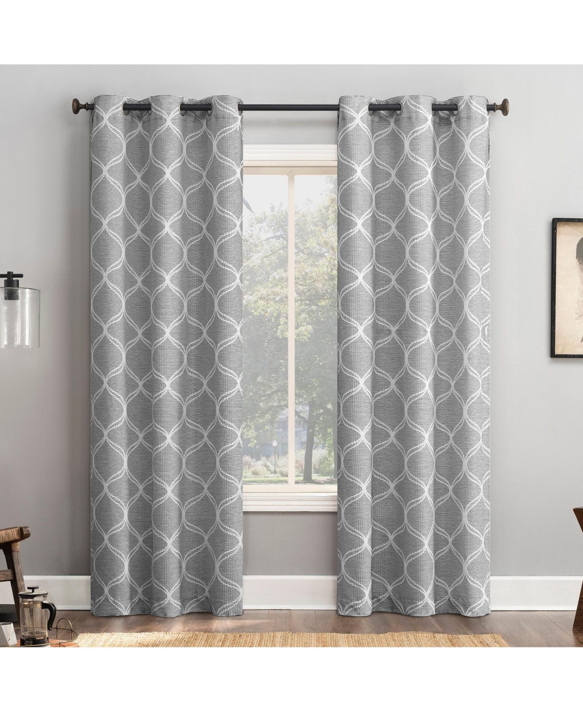 Click here for Sun Zero Tikal Woven Ogee 100 Blackout Grommet Cur... prices