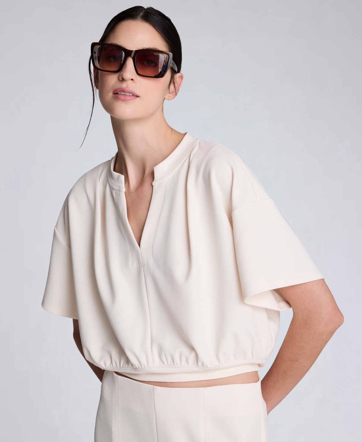 Click here for Kenneth Cole Womens Crewneck Crop Top - Oyster prices