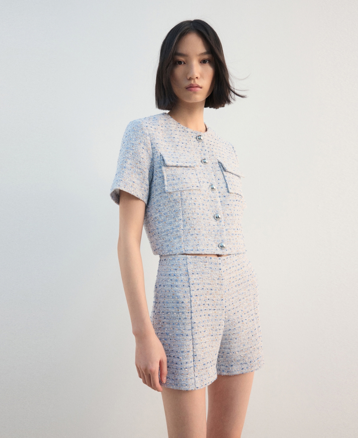 Click here for Mango Womens Mid-Rise Tweed Shorts - Sky Blue prices