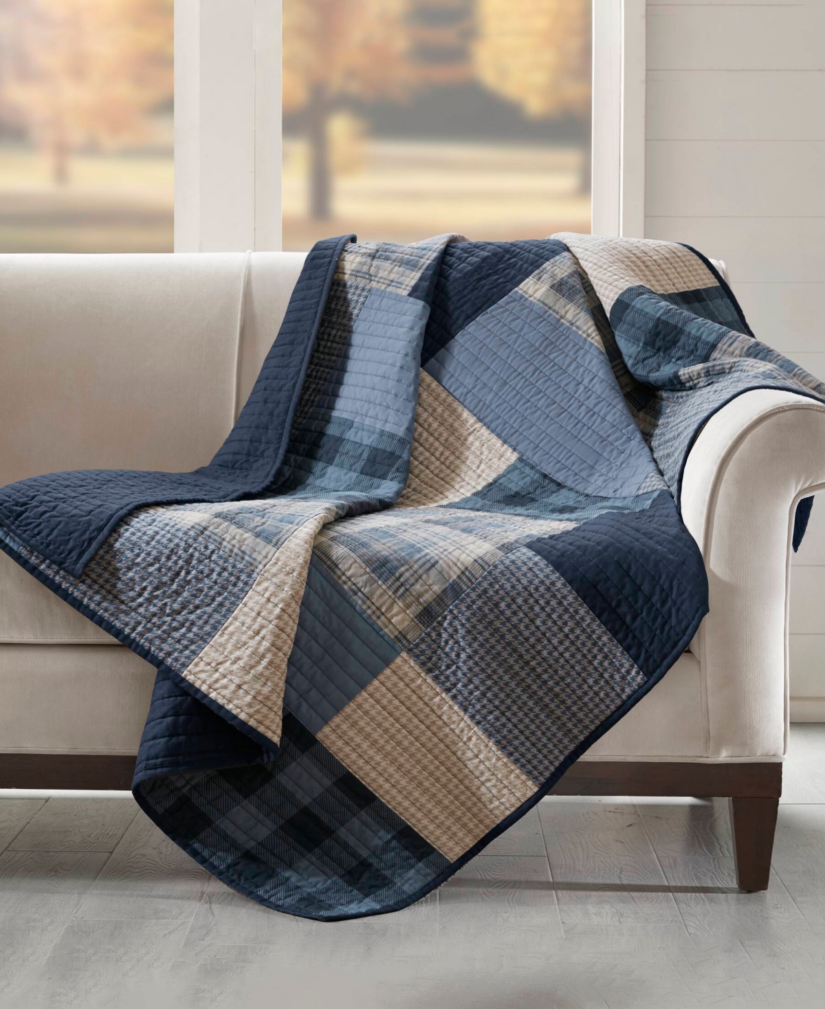 Click here for Woolrich Patchwork Quilted Throw  50 x 70 - Blue prices