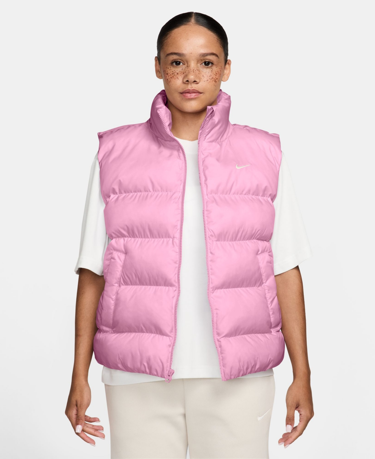 Click here for Nike Womens Therma-fit Loose-Fit Classic Vest - Pi... prices