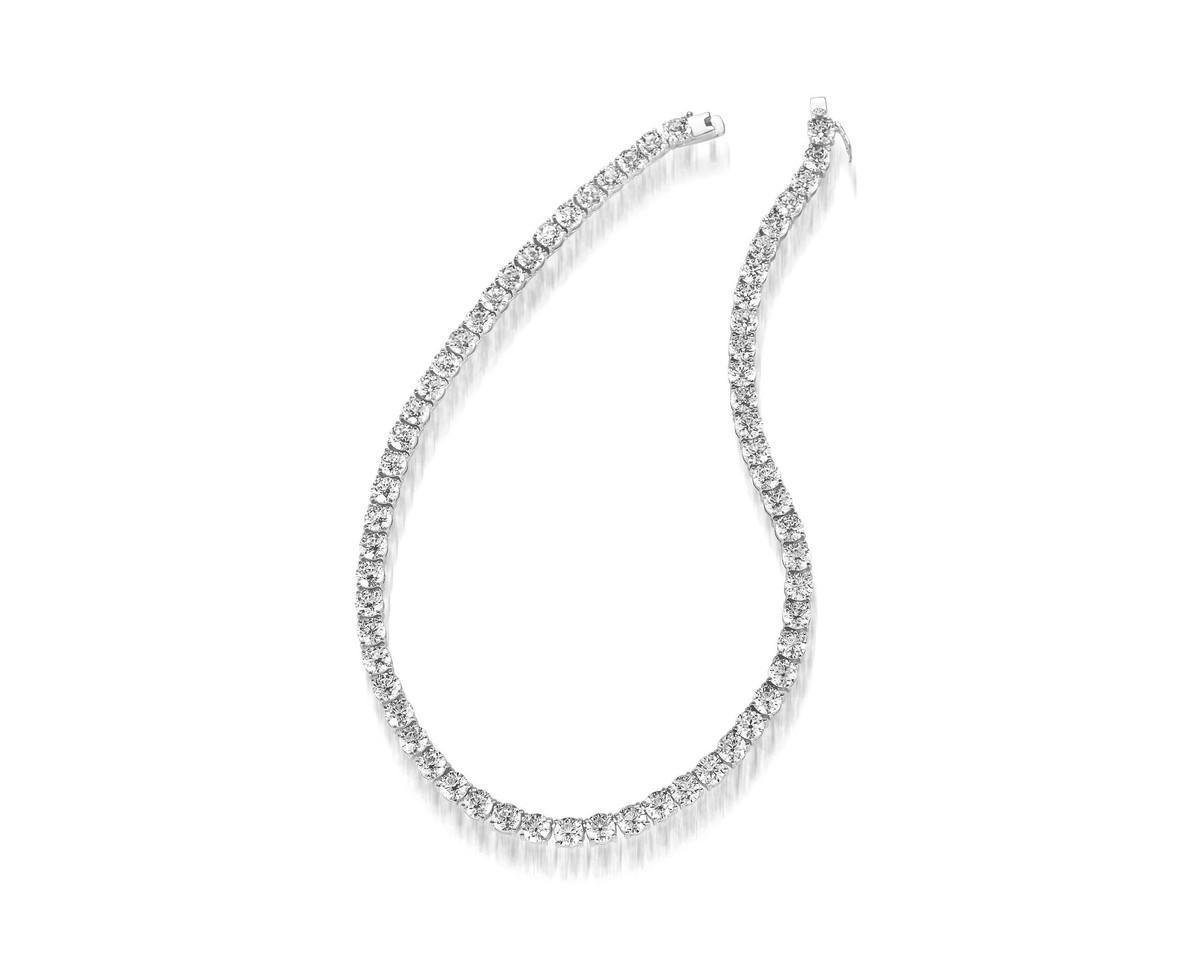 Click here for Genevive Elegant White Gold Plated 5MM Round Cz Te... prices