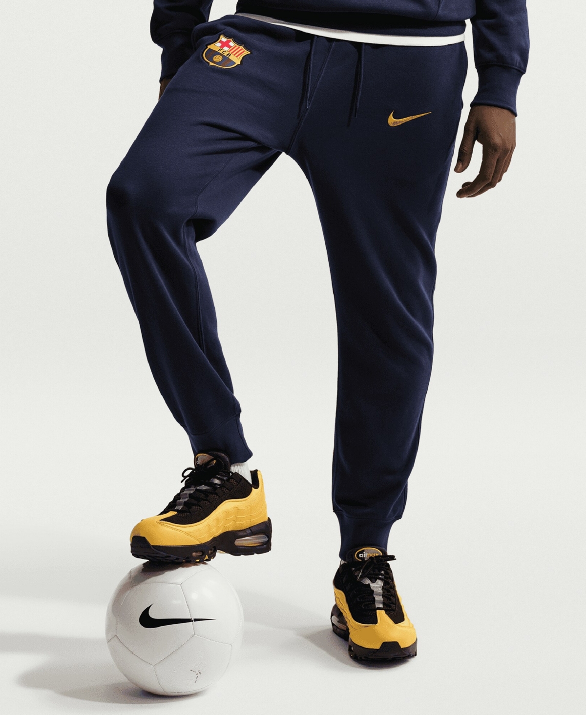 Click here for Nike Mens Blue Barcelona Club Joggers - Blue prices