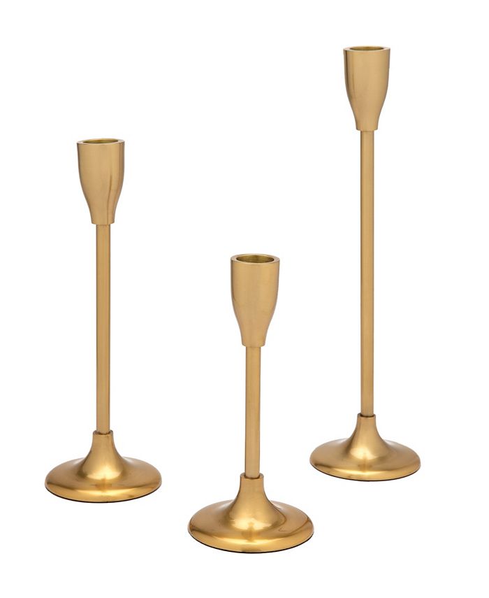 melted gold candlesticks