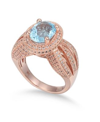 Click here for Suzy Levian Sterling Silver Oval Cut Center Topaz... prices