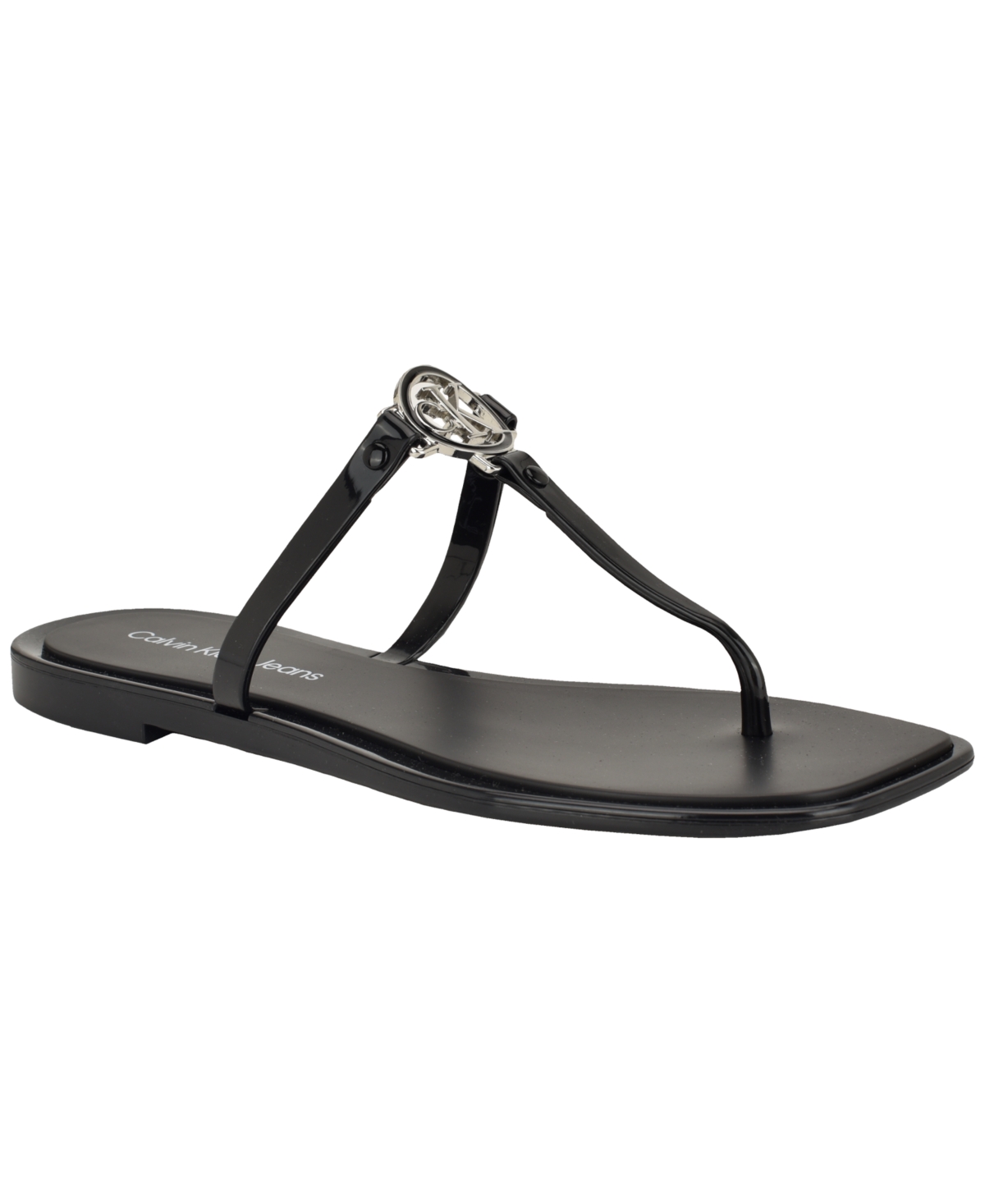 Click here for Calvin Klein Womens Ellye Logo T-Strap Flat Slip-O... prices