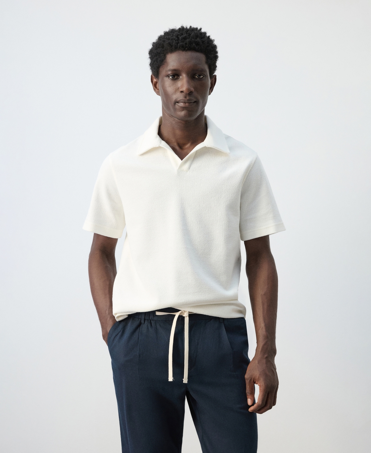 Click here for Mango Mens Regular-Fit Textured Polo Shirt - White prices