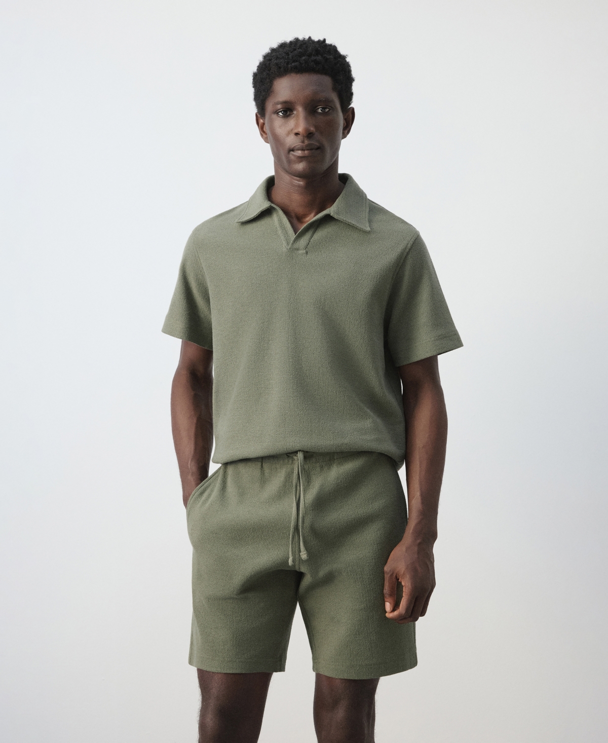 Click here for Mango Mens Regular-Fit Textured Polo Shirt - Fores... prices