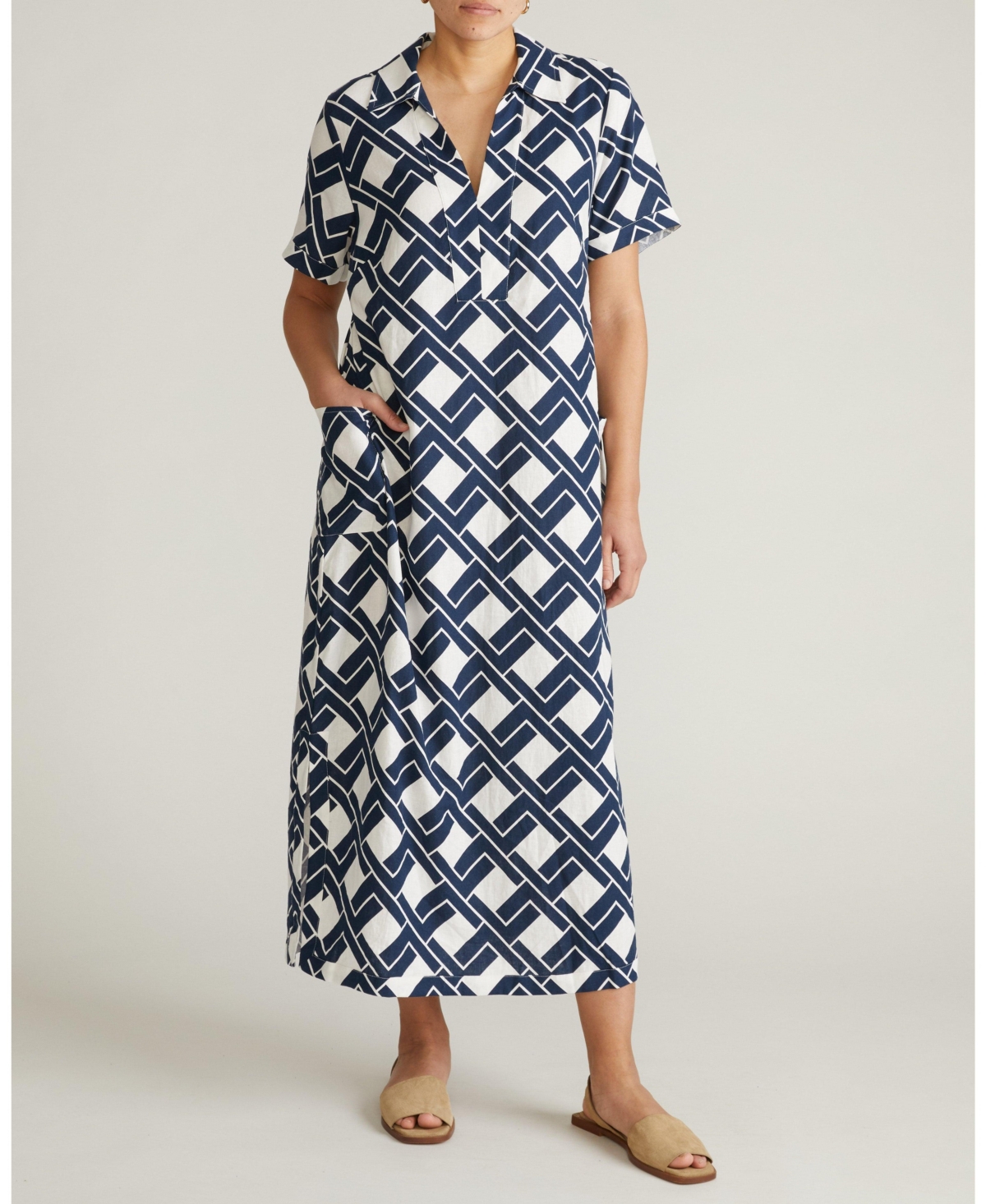 Click here for Universal Standard Plus Size Padma Polo Neck Linen... prices