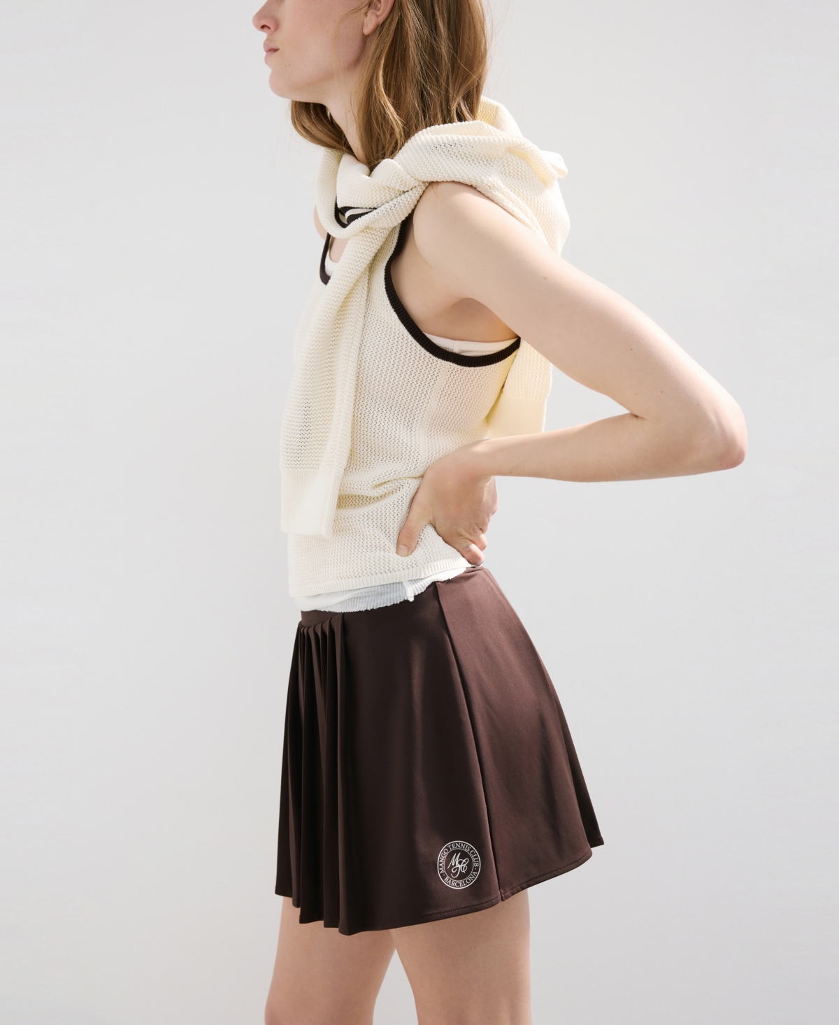 Click here for Mango Womens Printed Logo Pleated Skirt - Brown prices