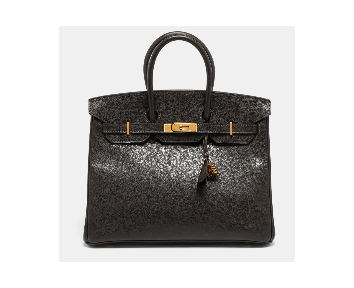 Click here for Pre-Owned Hermes Finish Ebene Leather prices