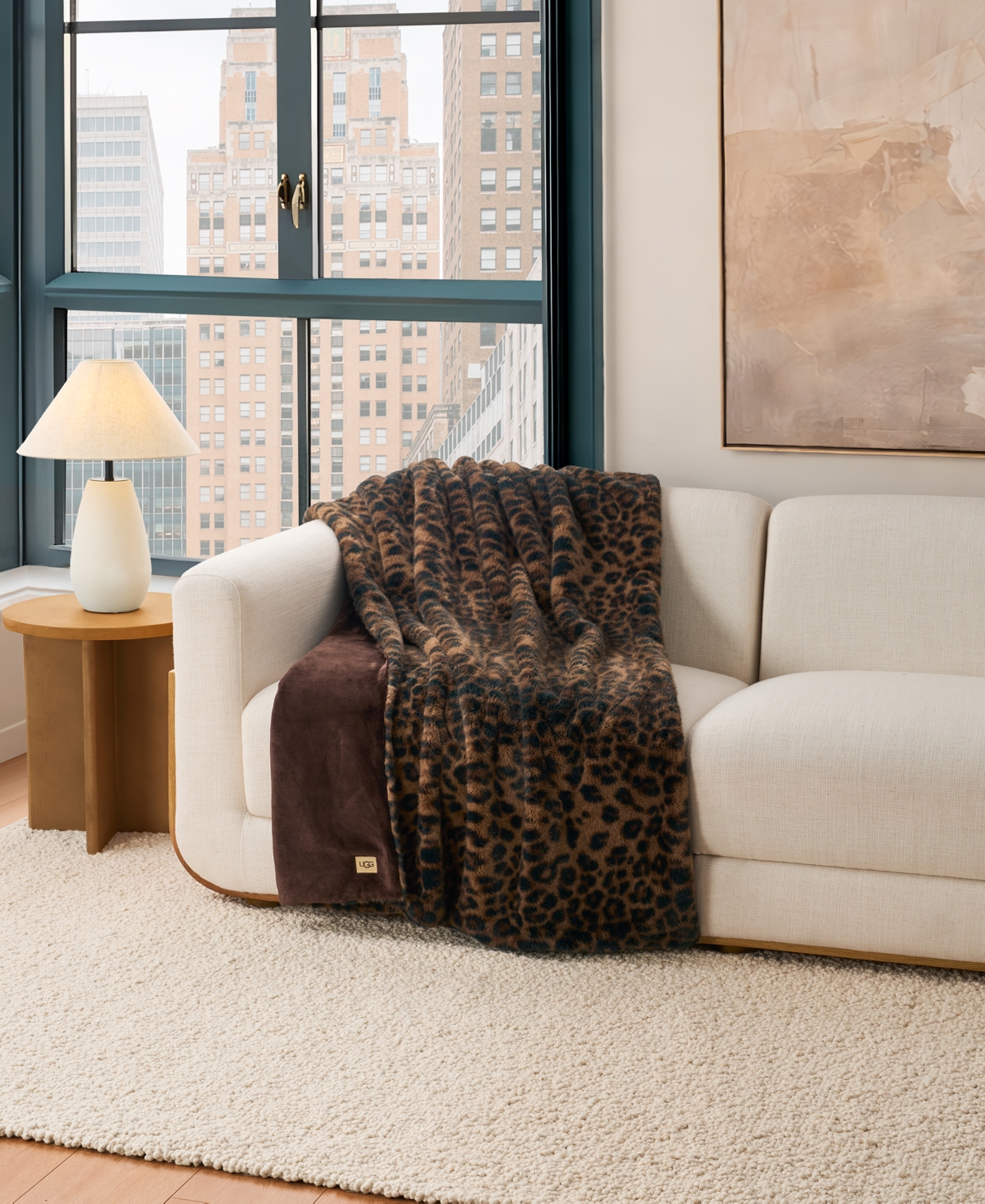 Click here for Ugg Everett Throw  50 x 70 - Leopard prices