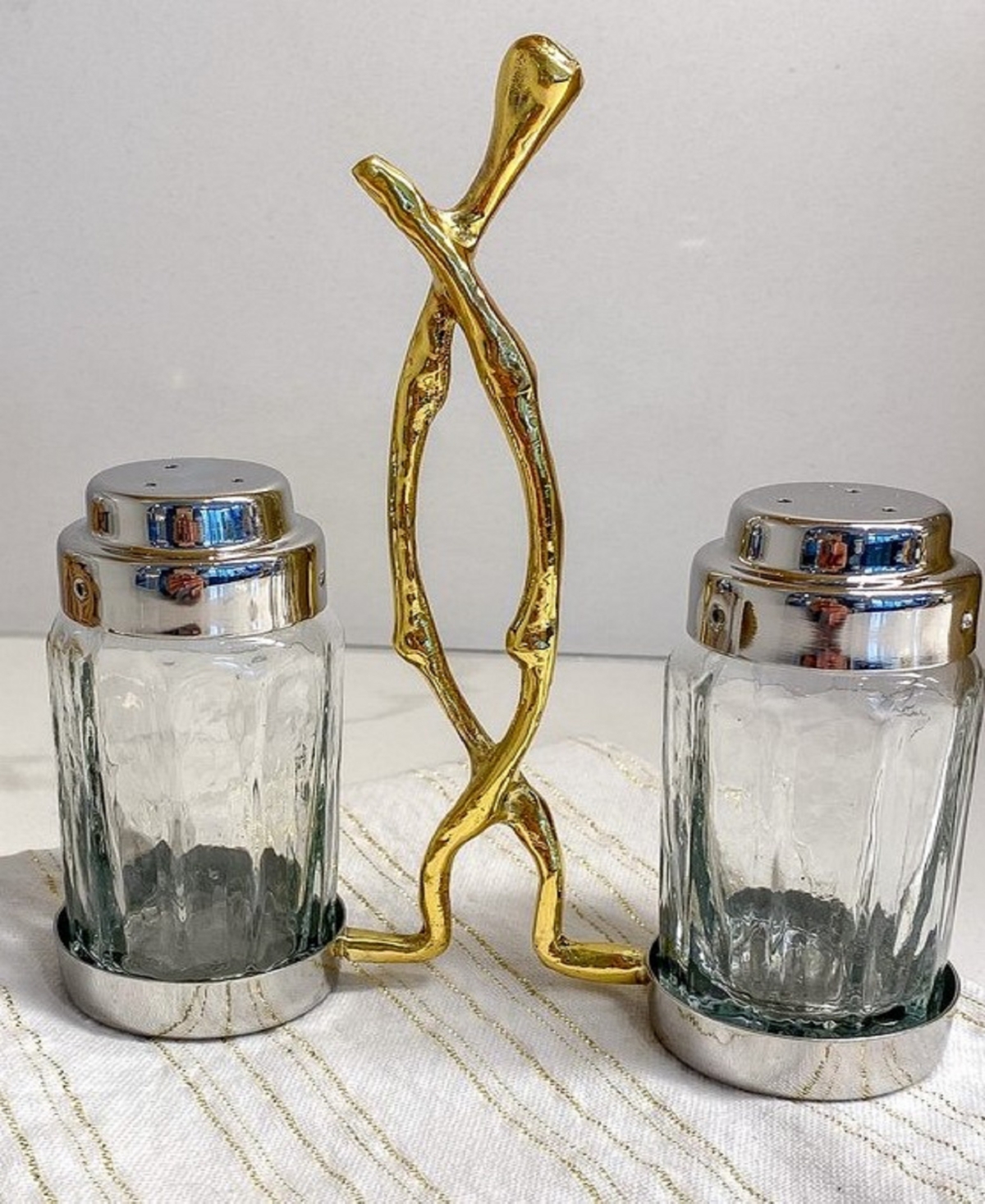 Click here for 4 Salt and Pepper Set with Twig Design - Clear prices