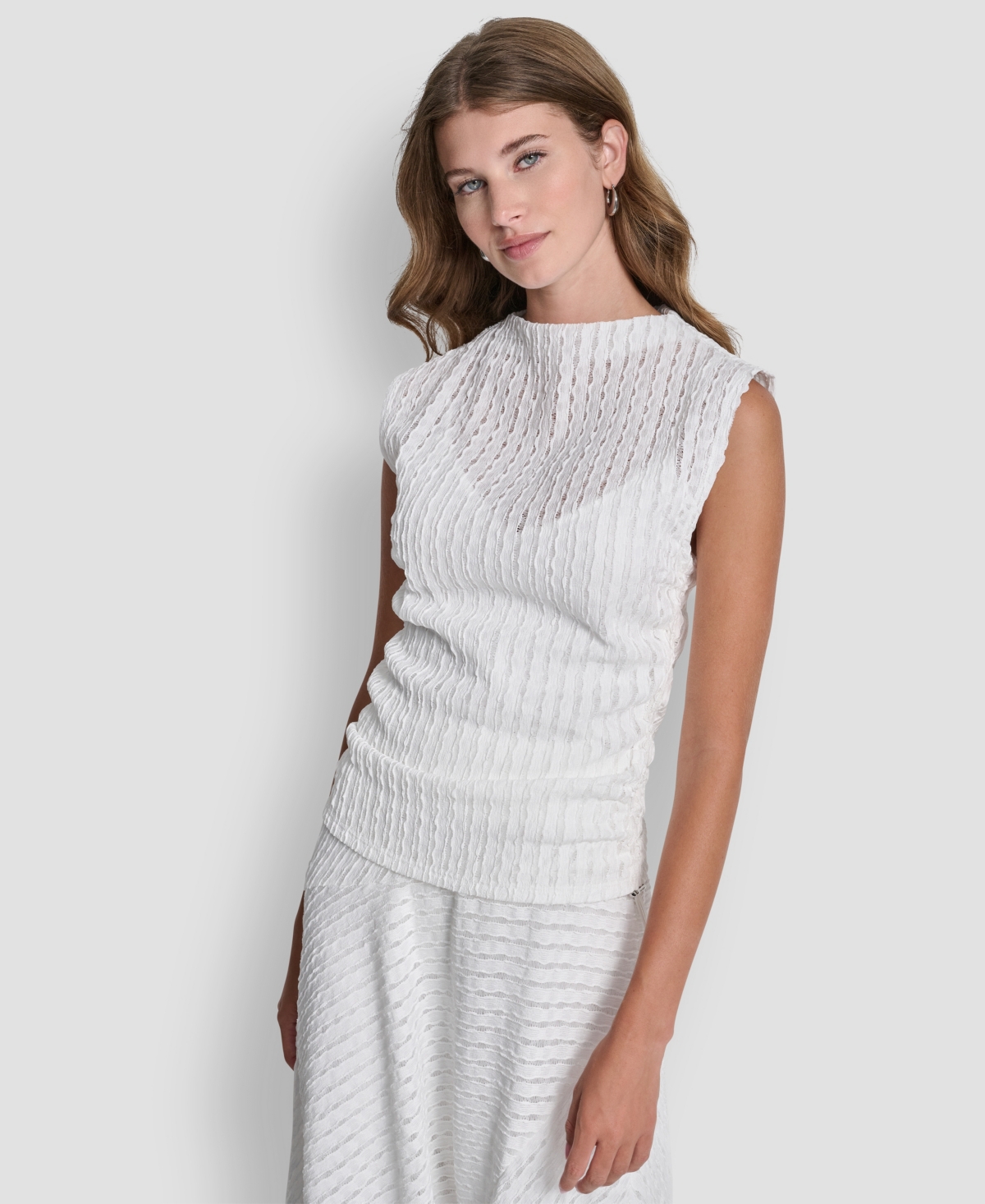 Click here for Dkny Womens Sleeveless Open Textured Top - Ivory prices