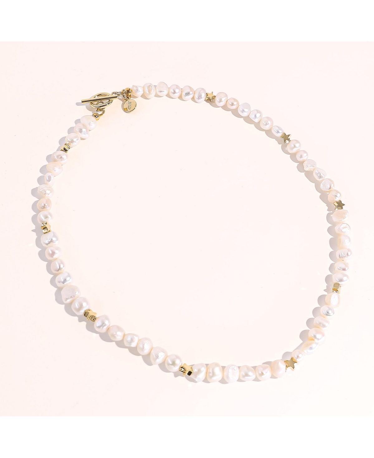 Click here for Twinkie Necklace - Gold and pearl prices