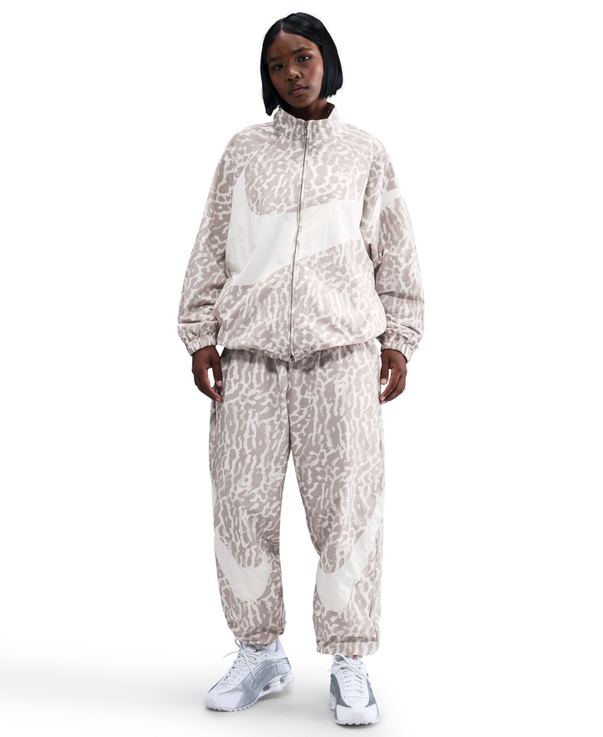 Click here for Nike Womens Printed Mid Rise Jogger Pants - Colleg... prices