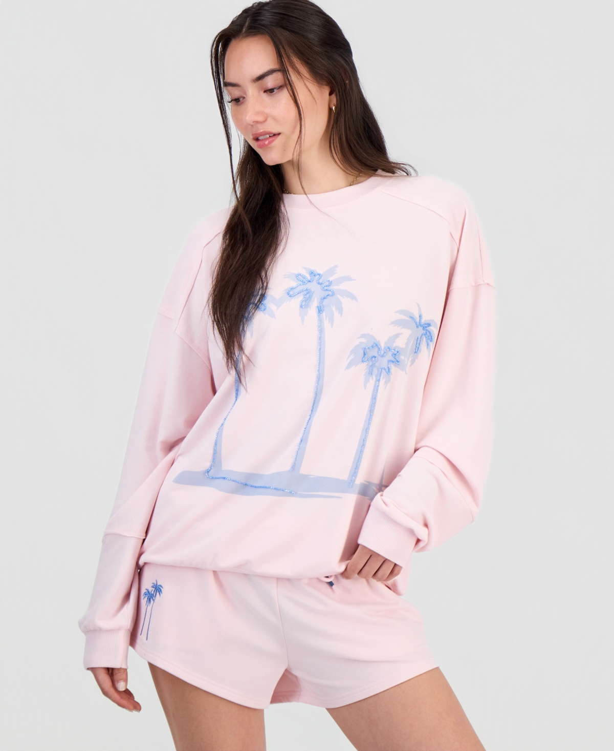 Click here for Rebel Veil Juniors Beaded Graphic-Print Sweatshirt... prices