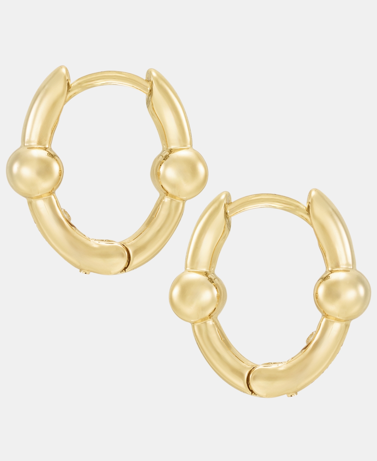 Click here for Anne Klein Gold-Tone Metal Ball Huggie Earrings -... prices