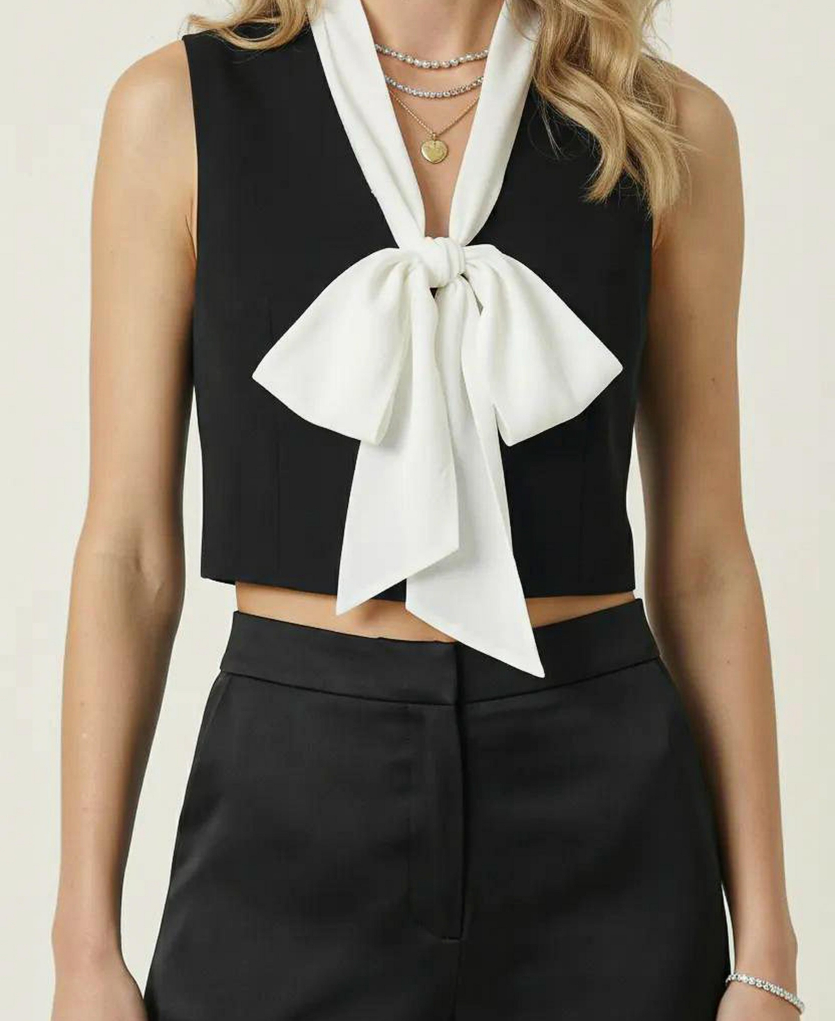 Click here for Modenaire Womens Contrast Bow Tie Neck Cropped Top... prices