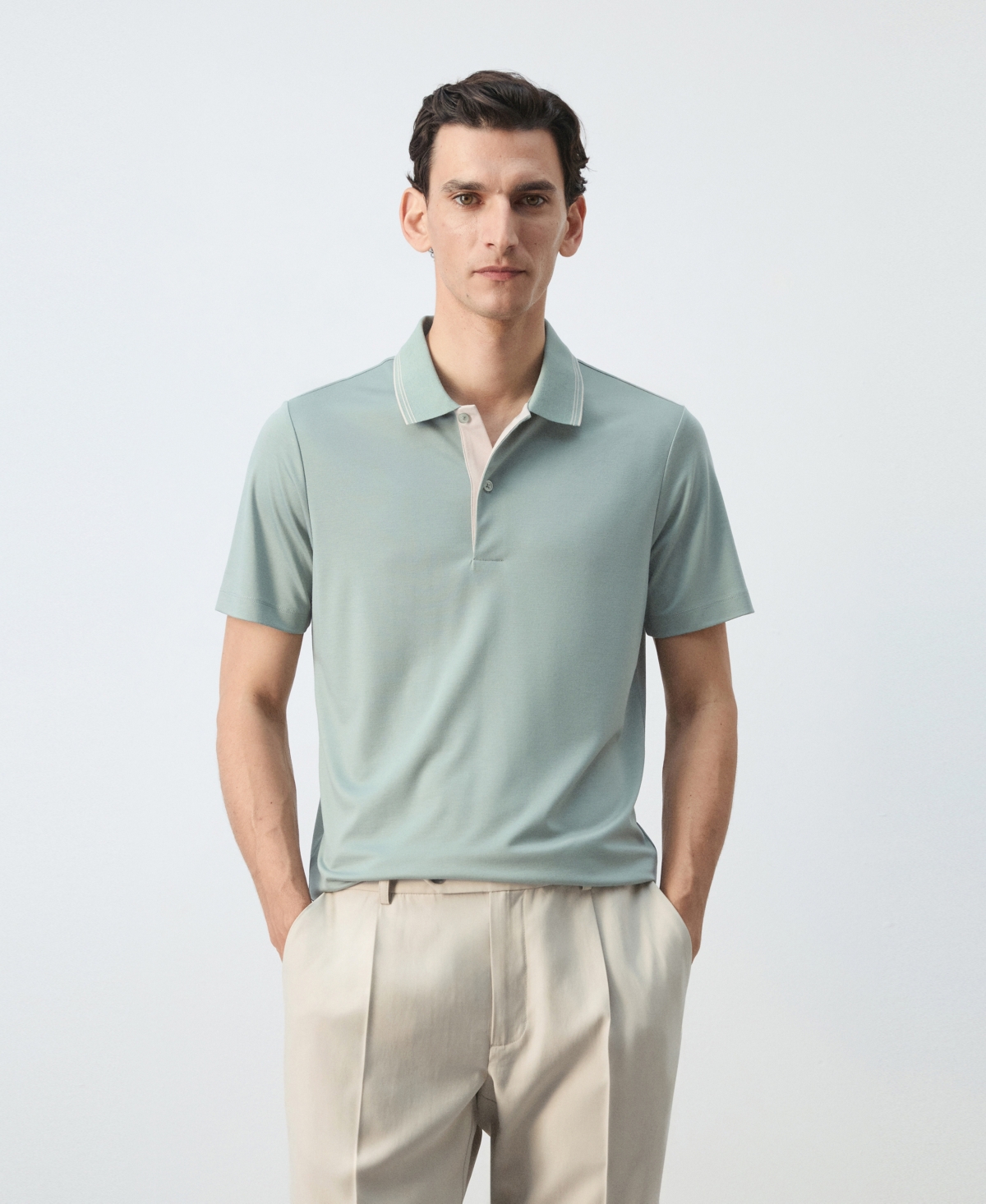 Click here for Mango Mens Slim-Fit Solid Polo Shirt - Emerald Gre... prices