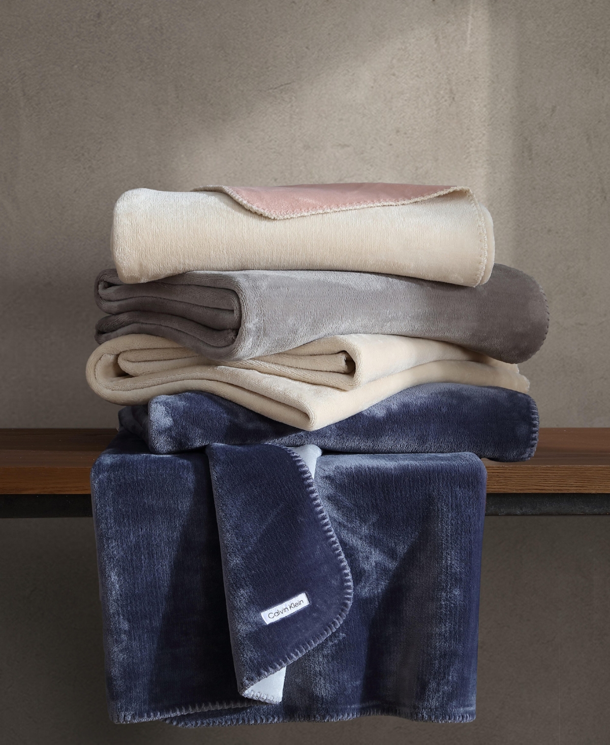 Click here for Calvin Klein Modern Solid Reversible Throw  70 X 5... prices