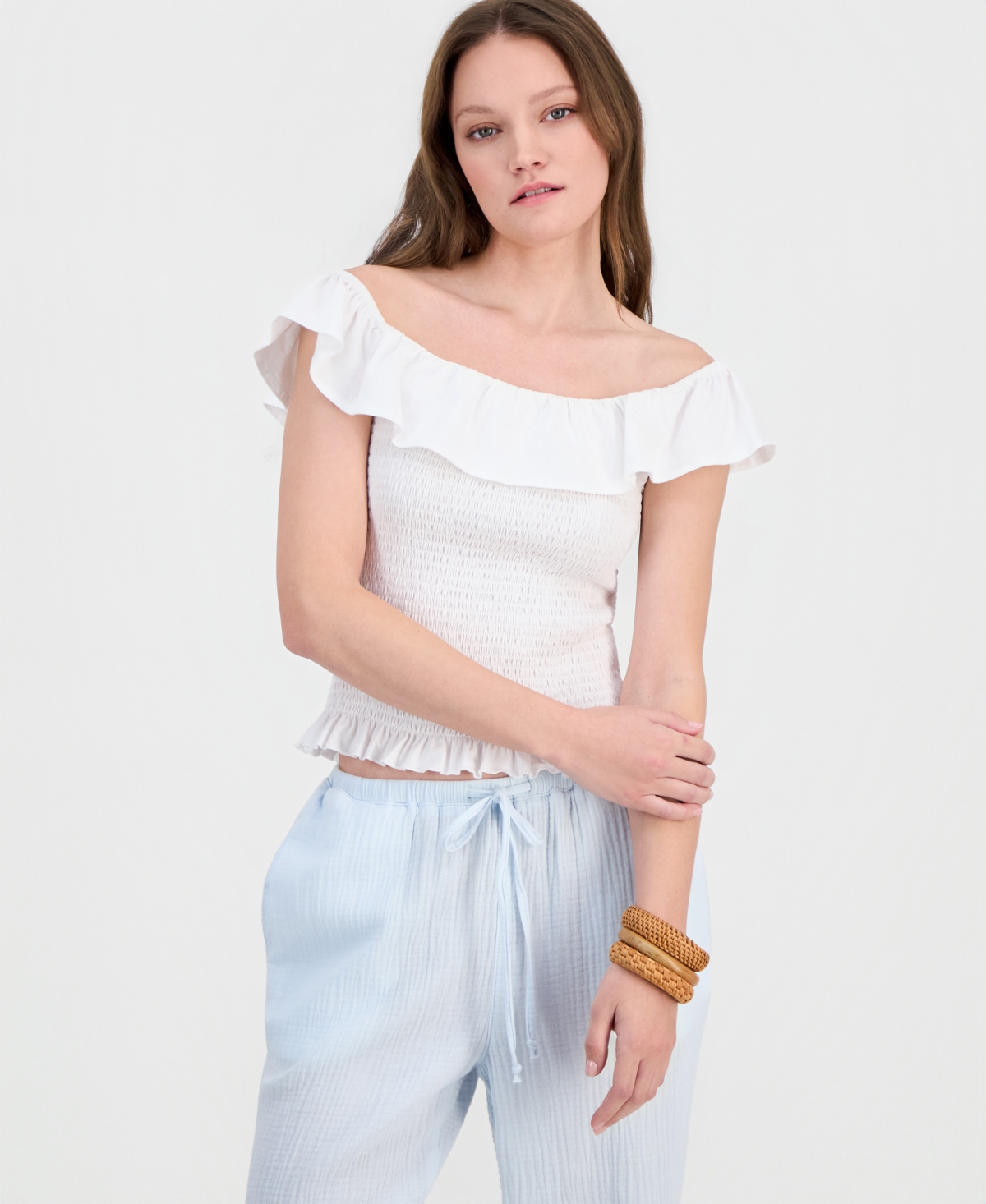 Click here for Just Polly Juniors Ruffled Smocked Scoop-Neck Top... prices