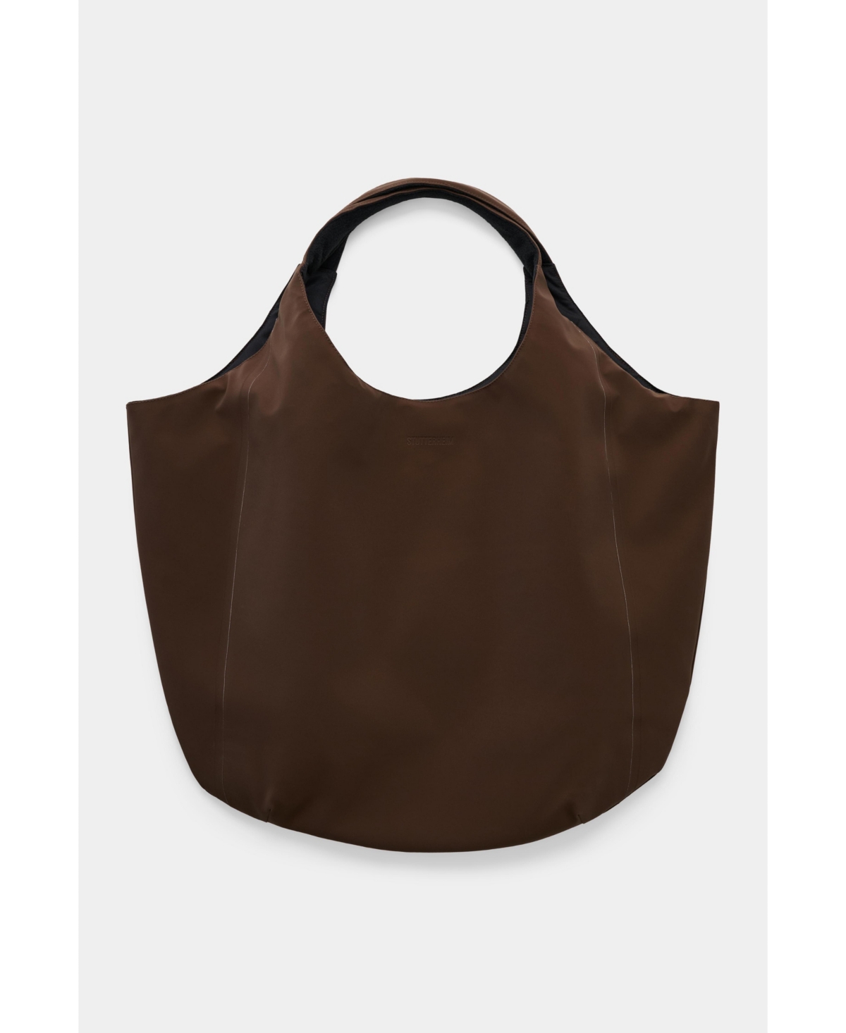 Click here for Stutterheim Svea Puffer Matte Bag - Dark brown prices